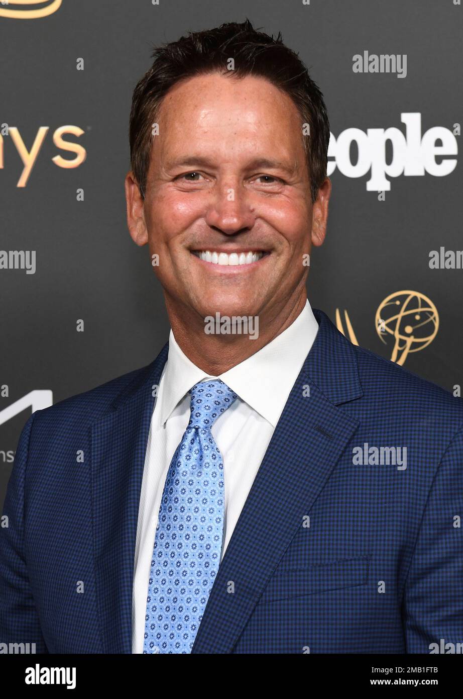 John Hartung of Spectrum SportsNet LA poses backstage during the 74th ...