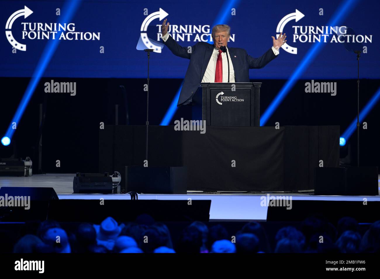 Former President Donald Trump addresses attendees during the Turning ...