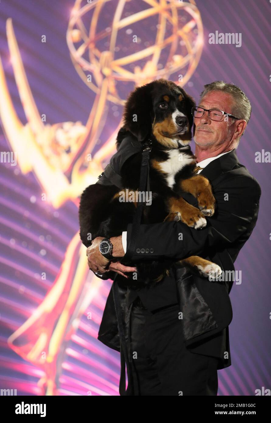 Cooper, left, and Mike Maas accepts the Short Promo - News/Topical Emmy ...