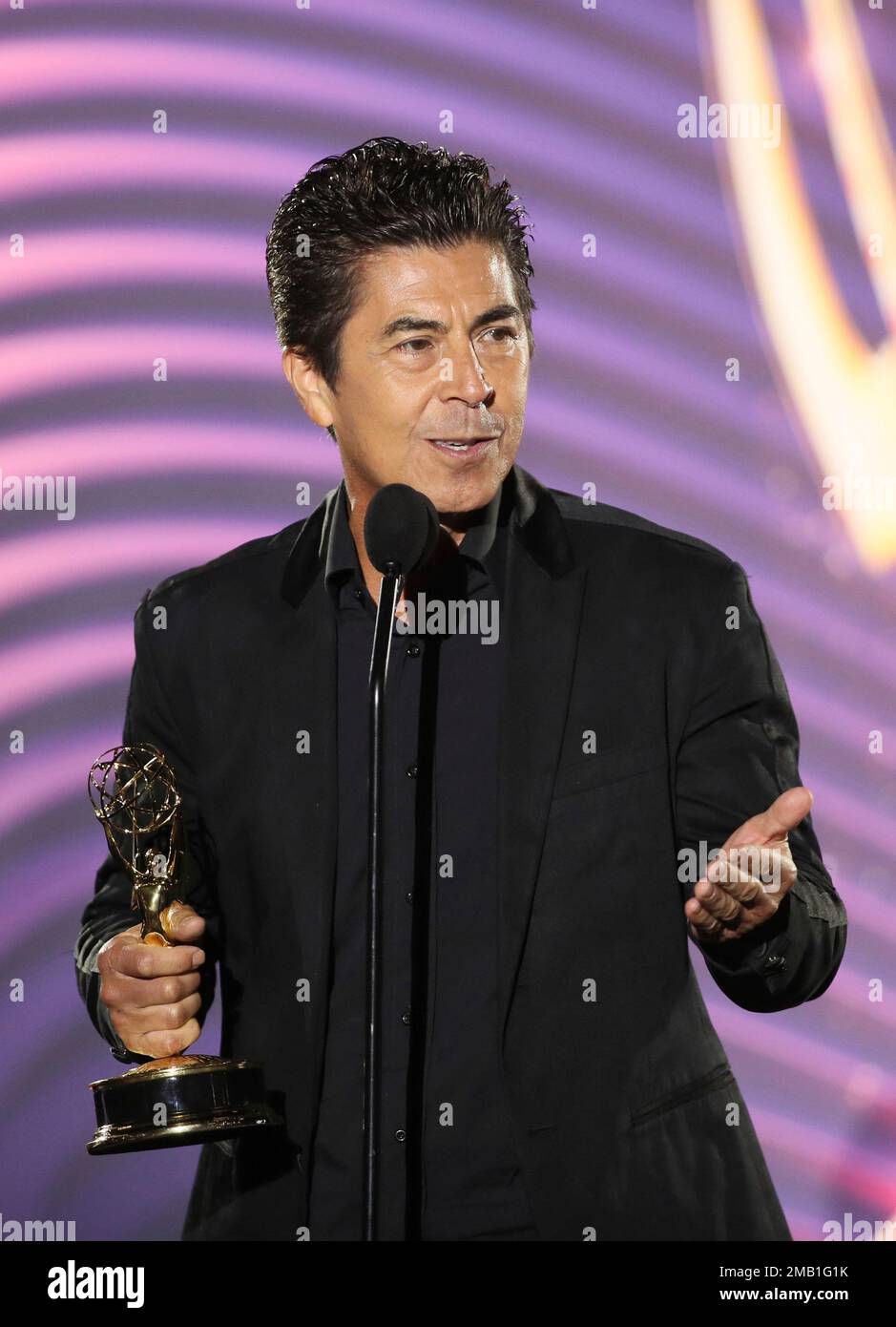 Mario Solis accepts the Sports News Story Emmy for NBC4's 'Jiggy Izzy ...