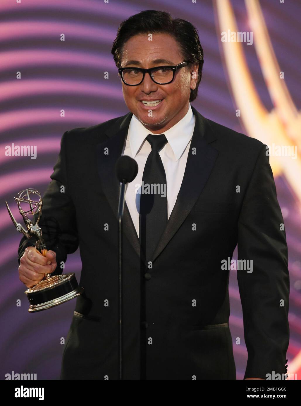 Tony Shin accepts the Live Coverage of an Unscheduled News Event Emmy ...