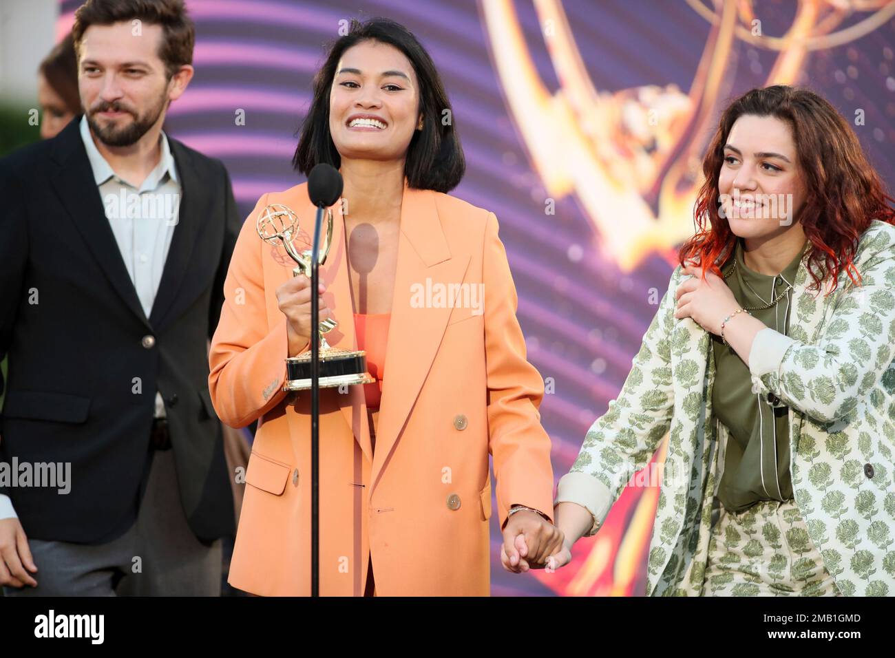 Rosey Alvero and her team accepts the Feature Segment Emmy for KCET's ...