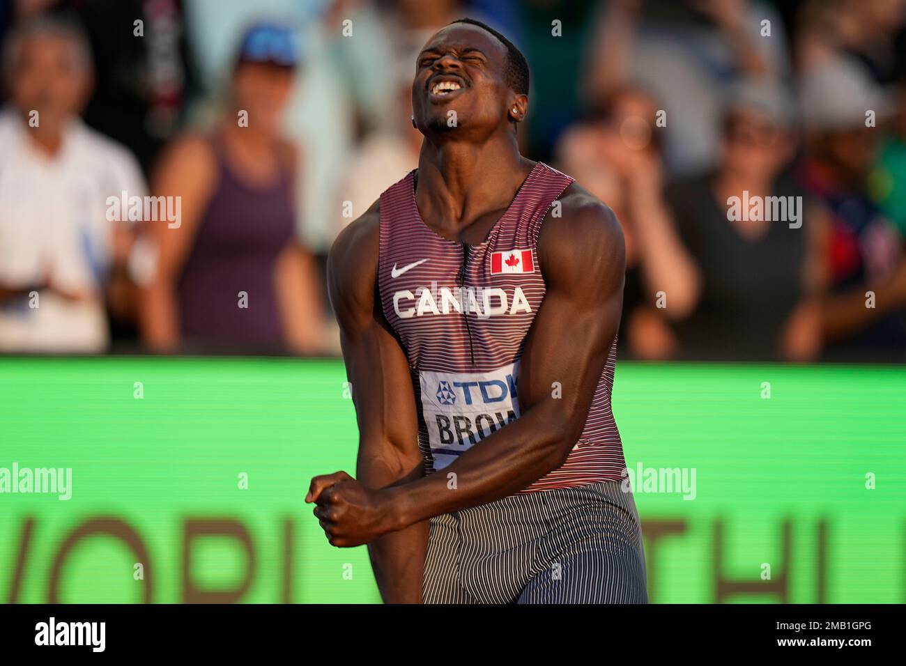 Aaron Brown, of Canada, celebrates after the final in the men's 4x100 ...