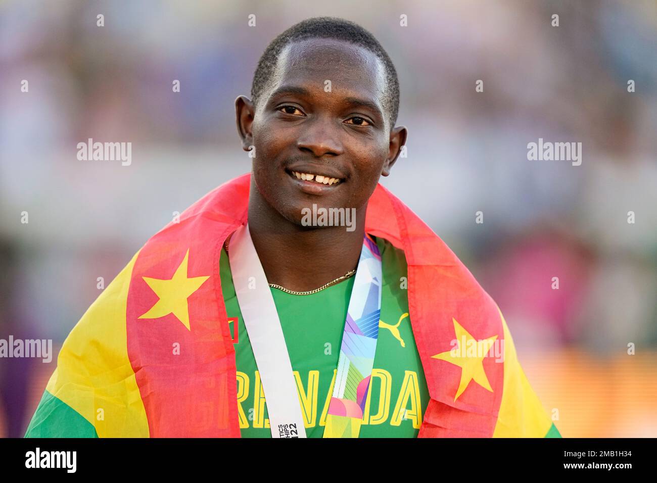 Gold medalist Anderson Peters, of Grenada, celebrates after the men's ...