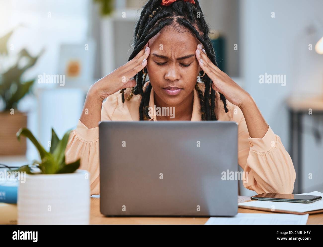 Black woman, headache and depression with laptop while tired in home ...