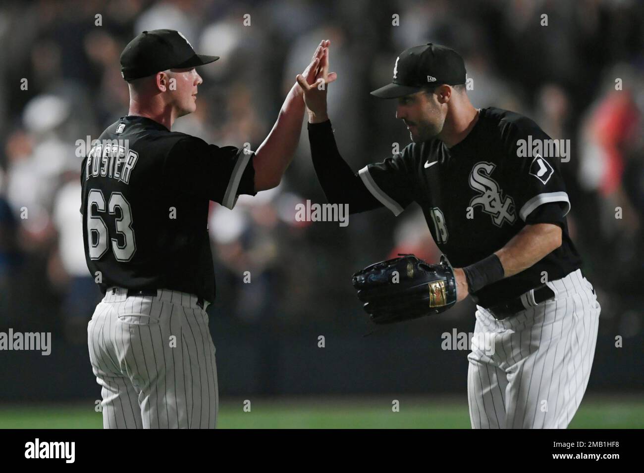 Chicago White Sox closing pitcher Matt Foster (63) celebrates with AJ ...