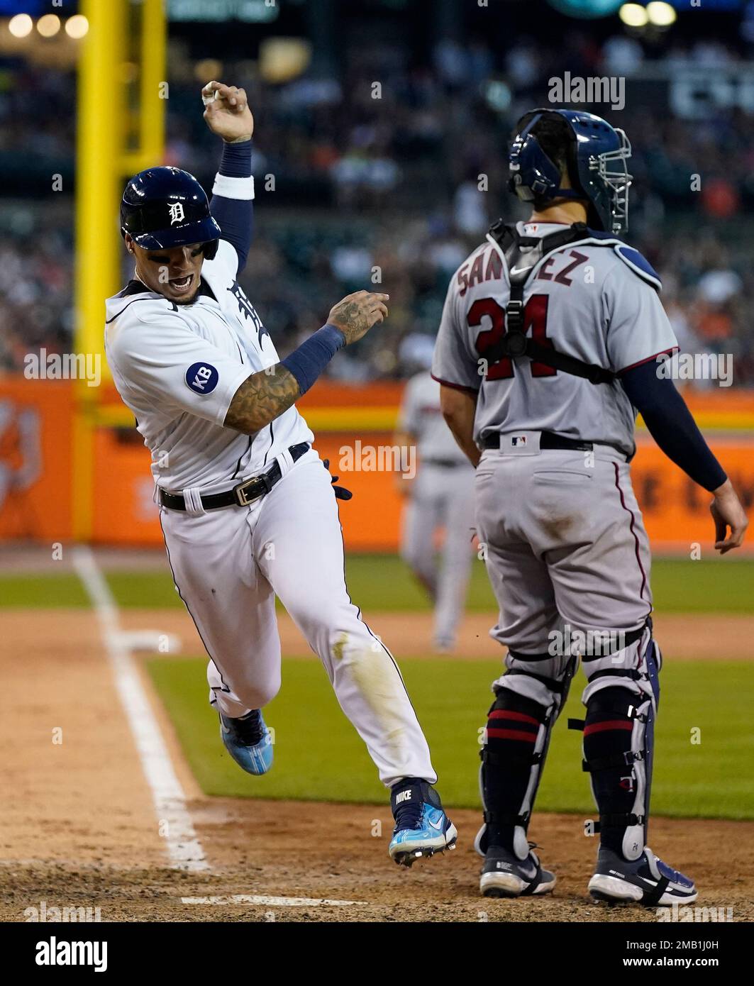 Detroit Tigers shortstop Javier Baez scores on a single by designated ...