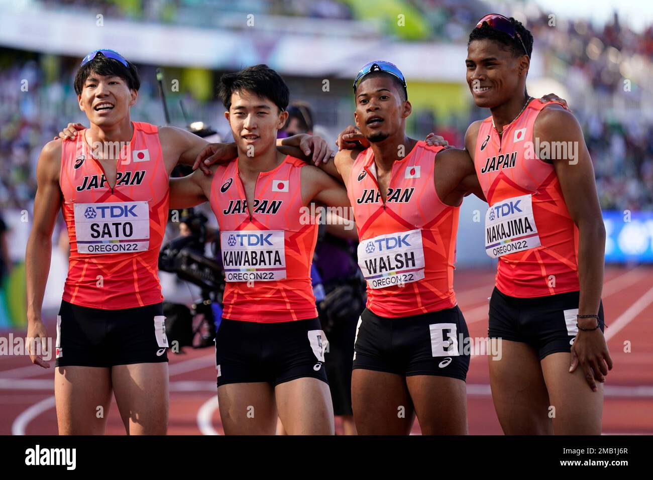 Team Japan poses on the track after a heat during the men's 4x400-meter ...