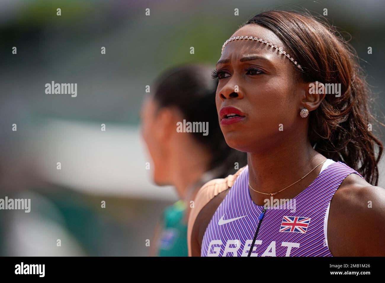 Cindy Sember, of Britain, reacts after a heat in the women's 100-meter ...