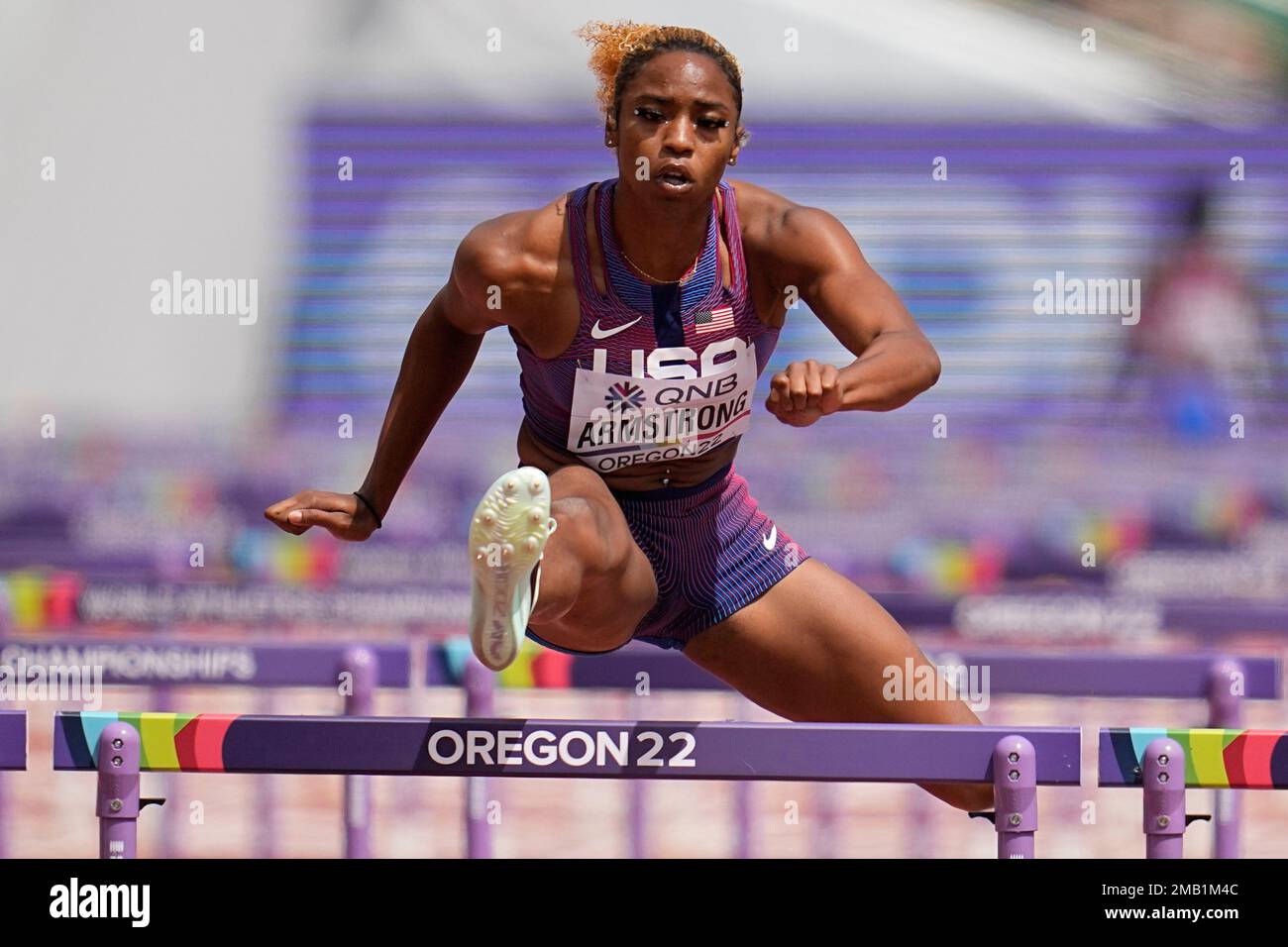 Alia Armstrong, of the United States, wins a heat in the women's 100 ...