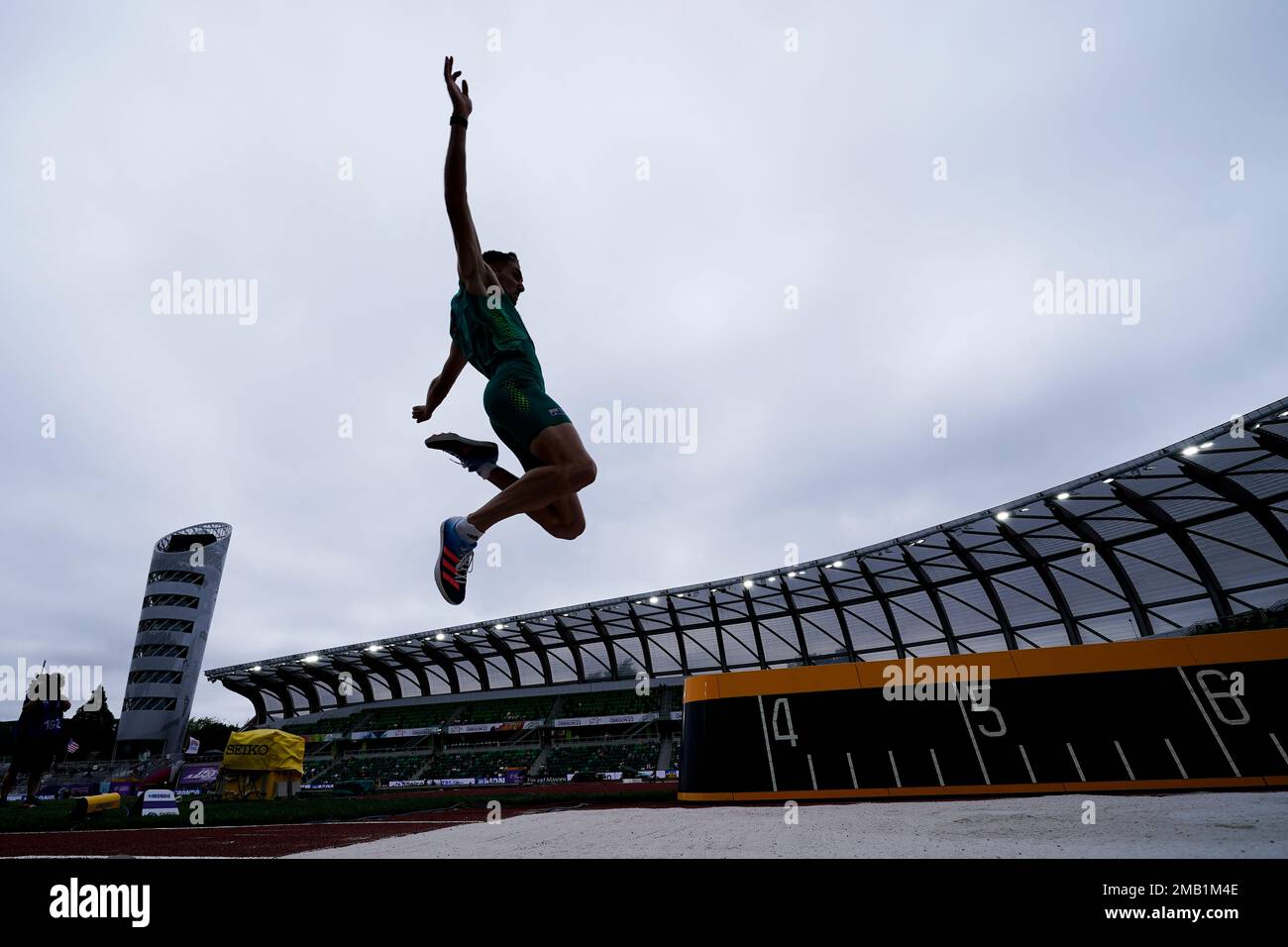 Cedric Dubler, of Australia, competes in the decathlon long jump at the ...