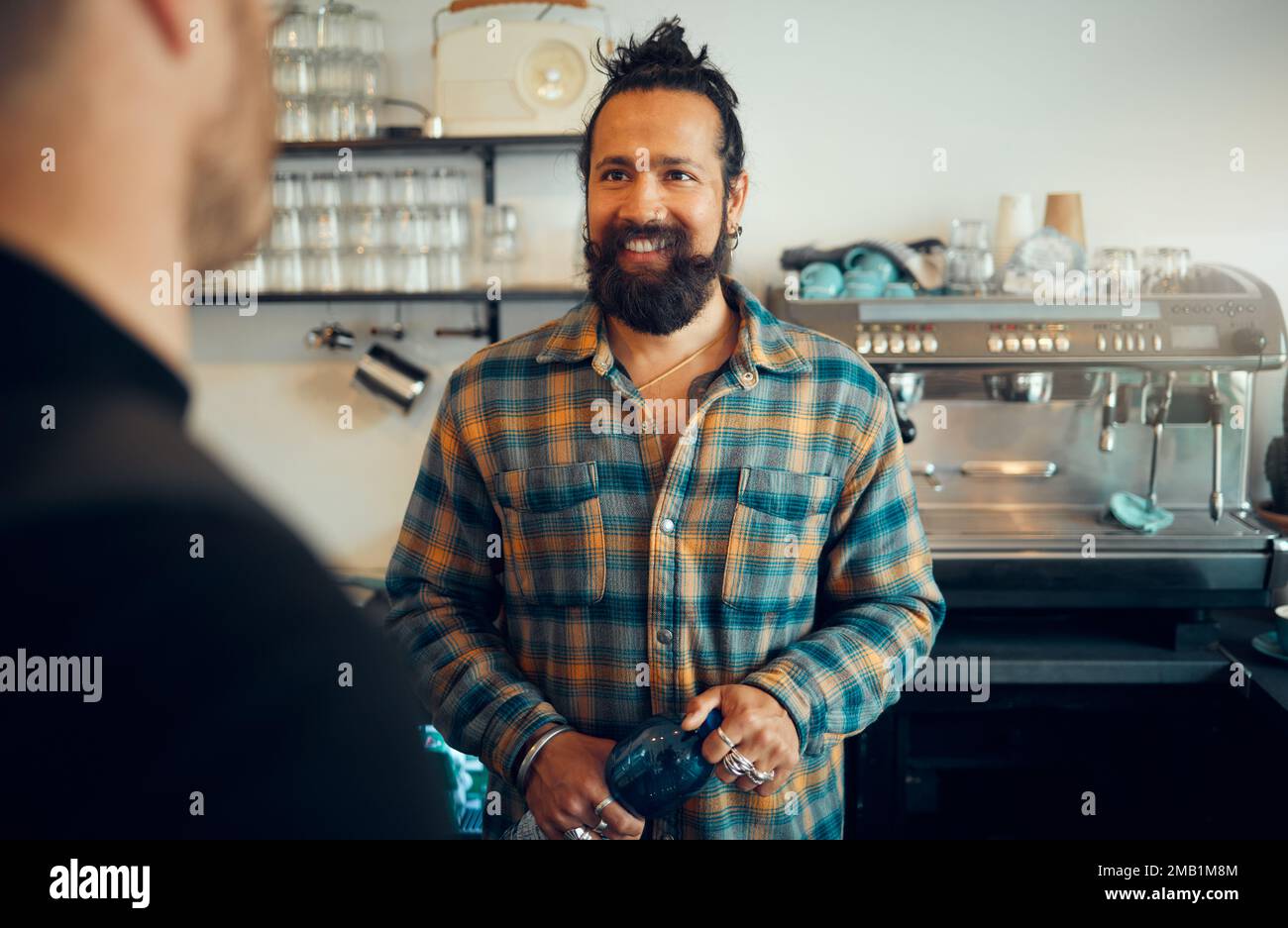 Man, barista helping customer and service in coffee shop, conversation ...