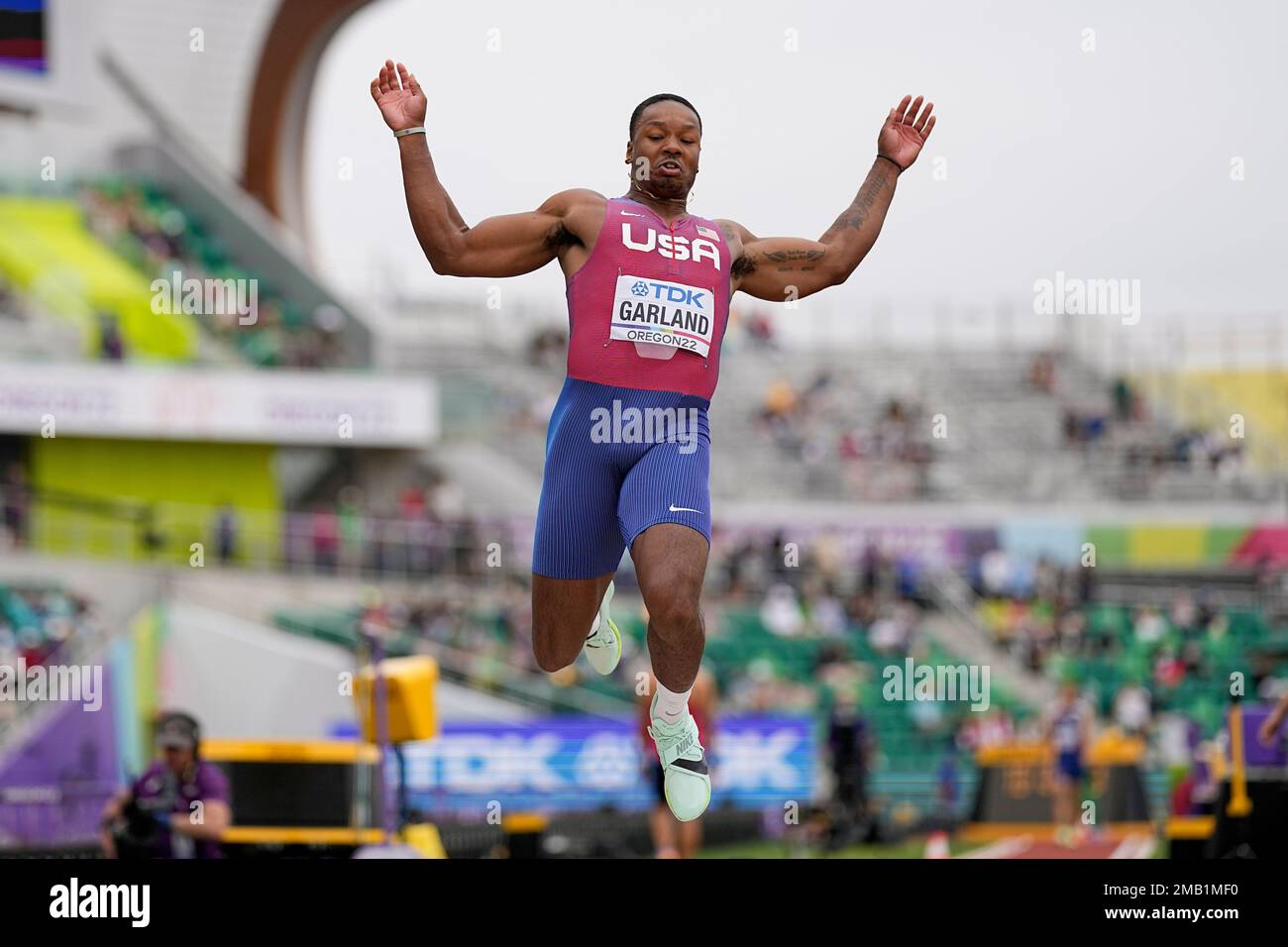 Kyle Garland, of the United States, competes in the decathlon long jump ...