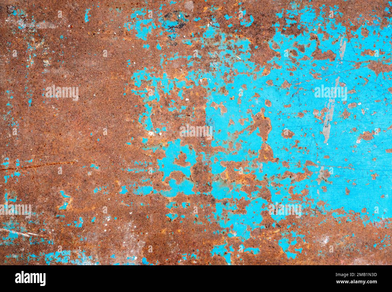 Rusted iron sheet, panel with old blue paint on surface as texture or ...