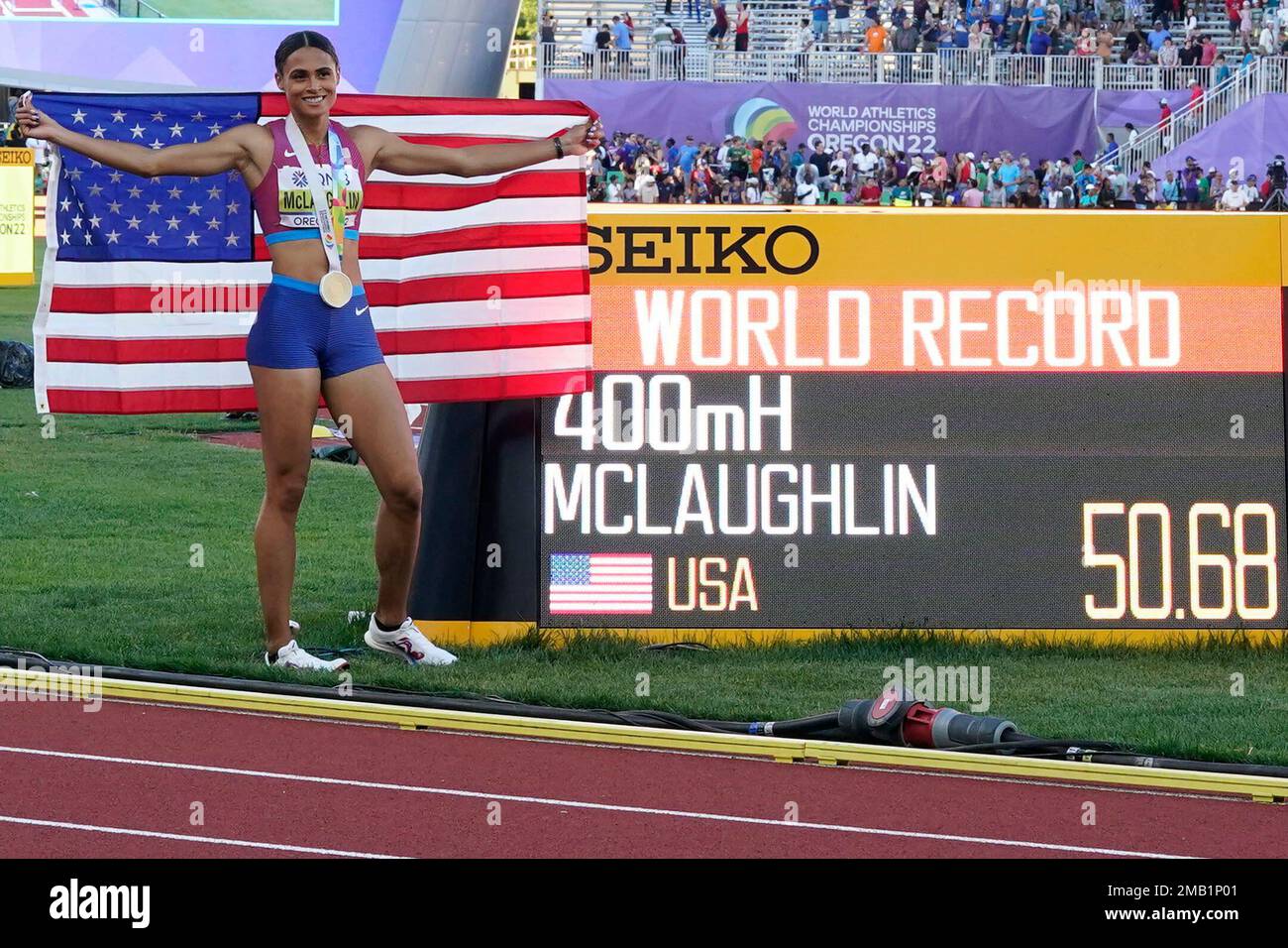 Gold medalist Sydney McLaughlin, of the United States, celebrates after ...