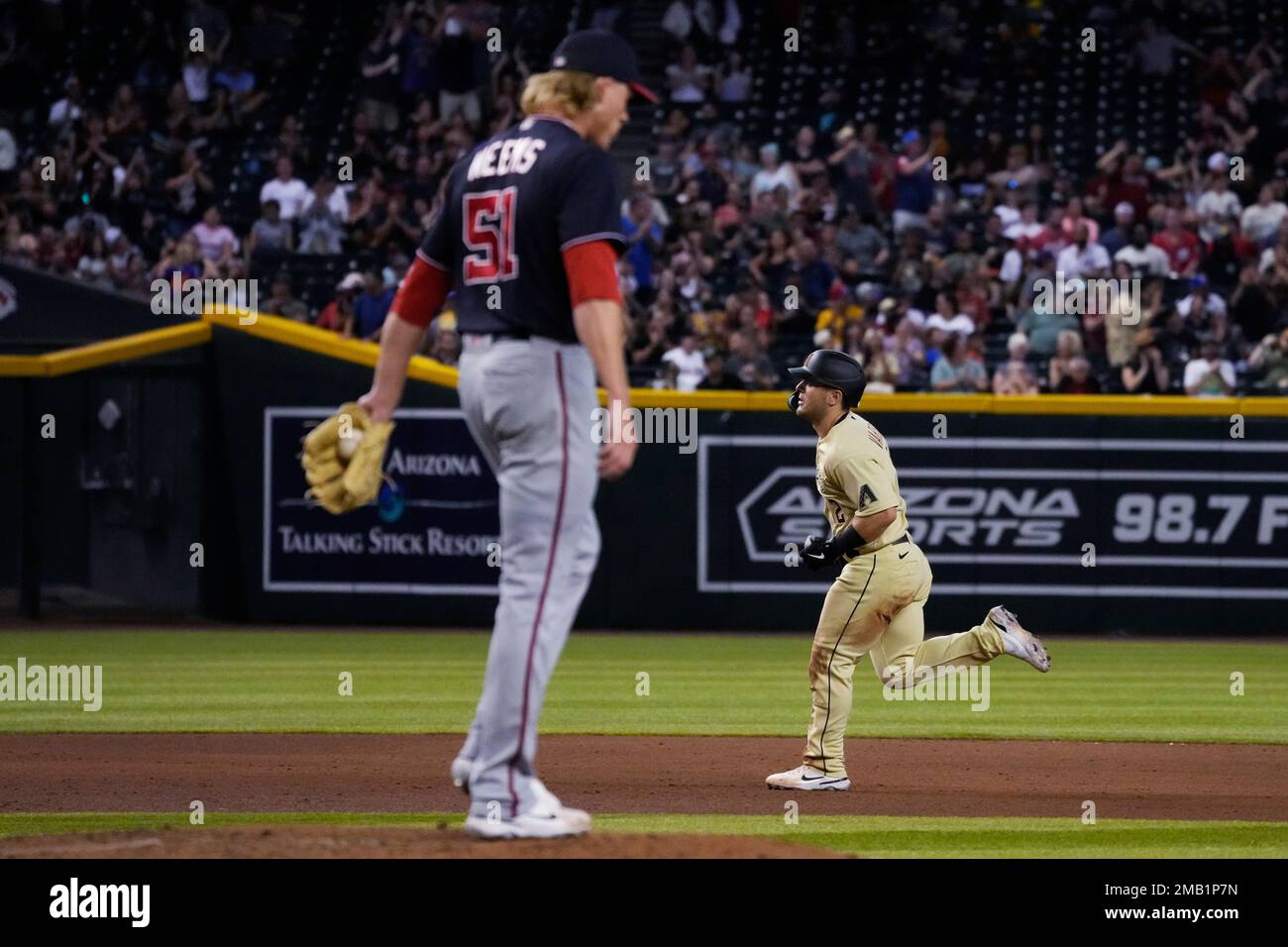 Arizona Diamondbacks' Daulton Varsho runs the bases after hitting a ...