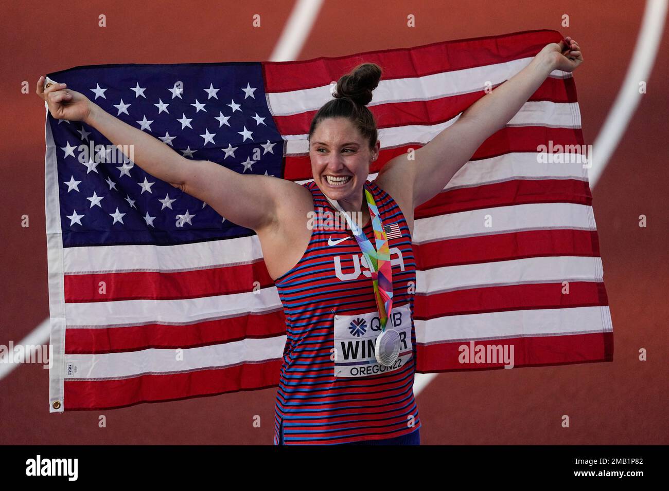 Silver medalist Kara Winger, of the United States, celebrates after the ...