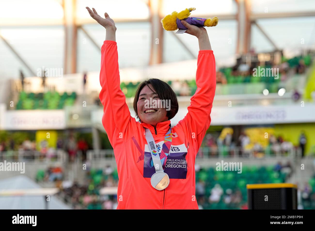 Bronze medalist Haruka Kitaguchi, of Japan, poses during a medal ...