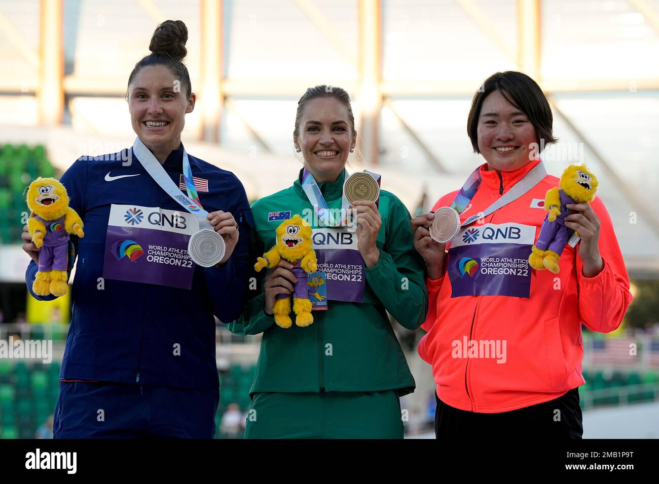 Gold medalist Kelsey-Lee Barber, of Australia, center, stands with ...