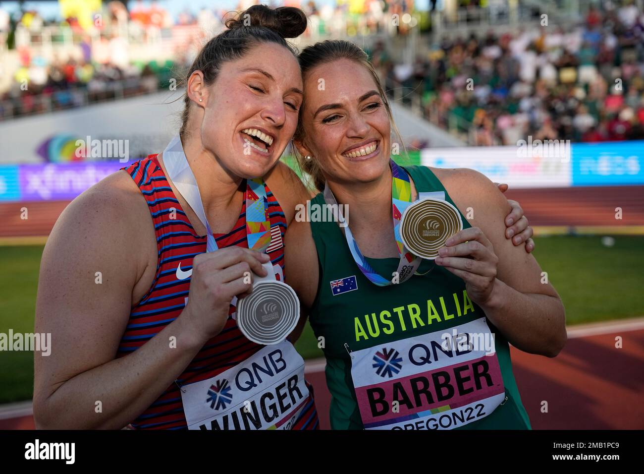 Gold medalist Kelsey-Lee Barber, of Australia, right, celebrates with ...