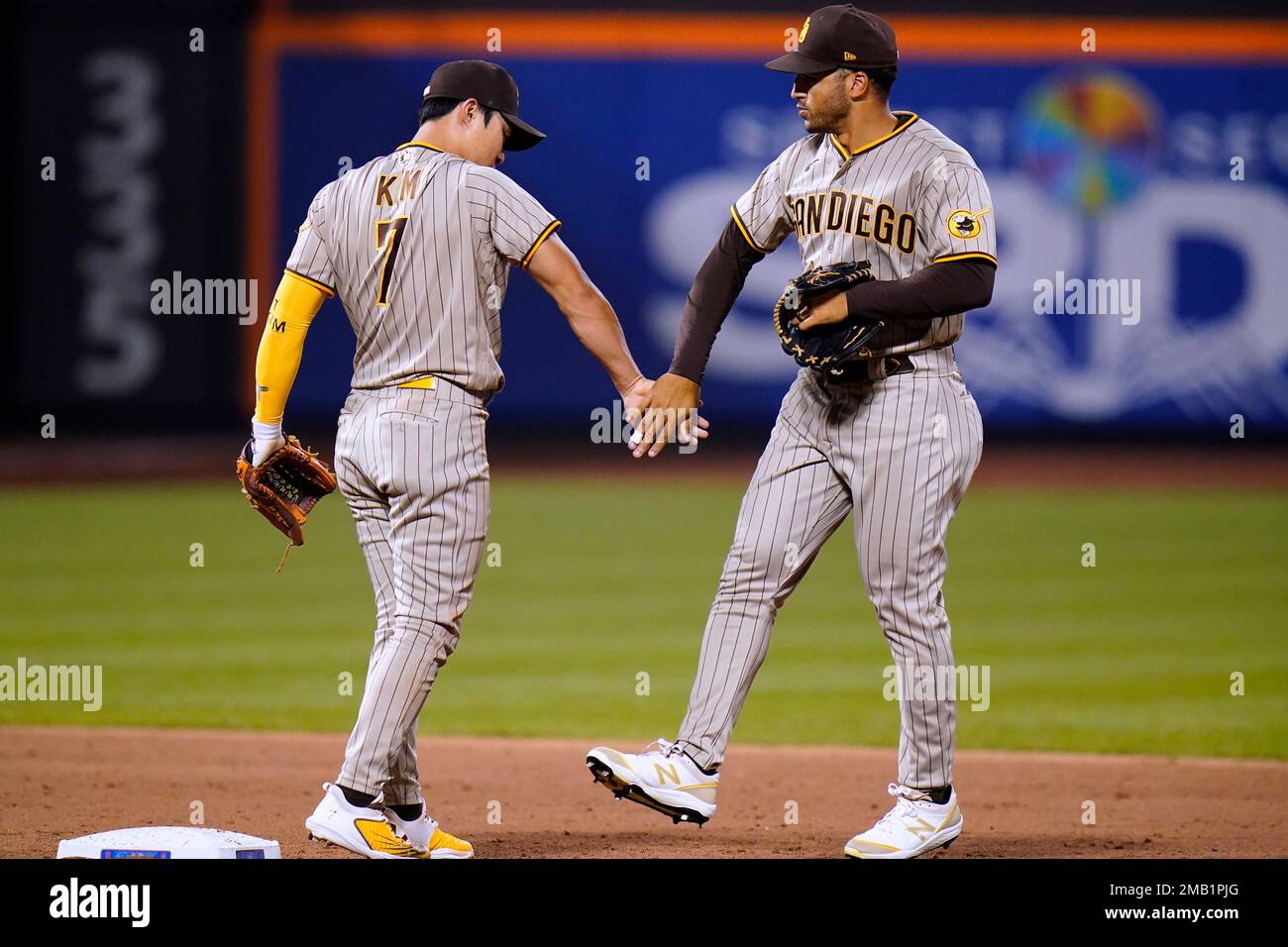 San Diego Padres' Ha-Seong Kim, left, celebrates with Esteury Ruiz ...