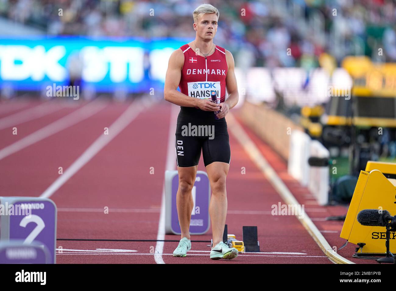 Simon Hansen, of Denmark, competes in a heat during the men's 4x100 ...