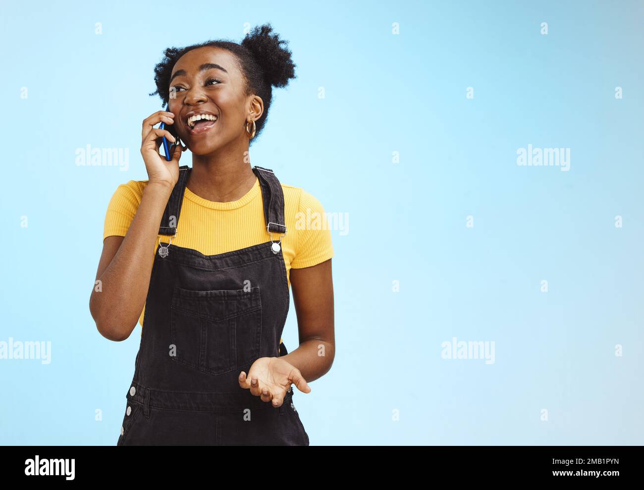 Communication, happy and talking black woman on a phone call isolated ...