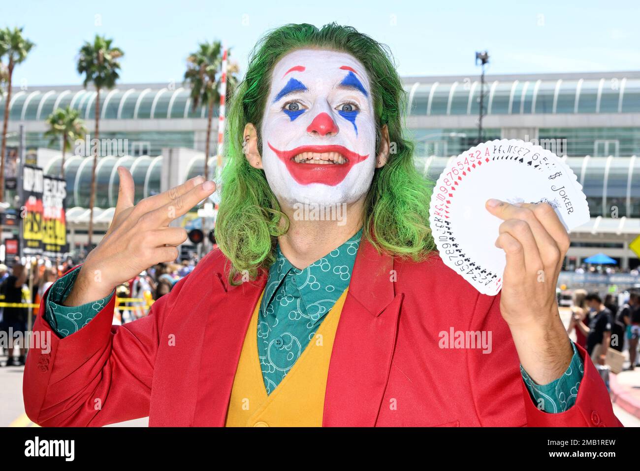 Jack Murdoch of San Clemente, Calif, dressed as the Joker, poses for a ...