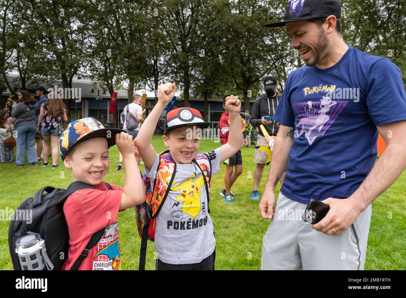 IMAGE DISTRIBUTED FOR NIANTIC - Trainers celebrate catching a Pokémon ...