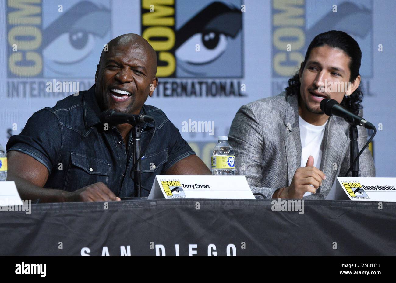 Terry Crews,left, and Danny Ramirez attend a panel for "Tales of the ...