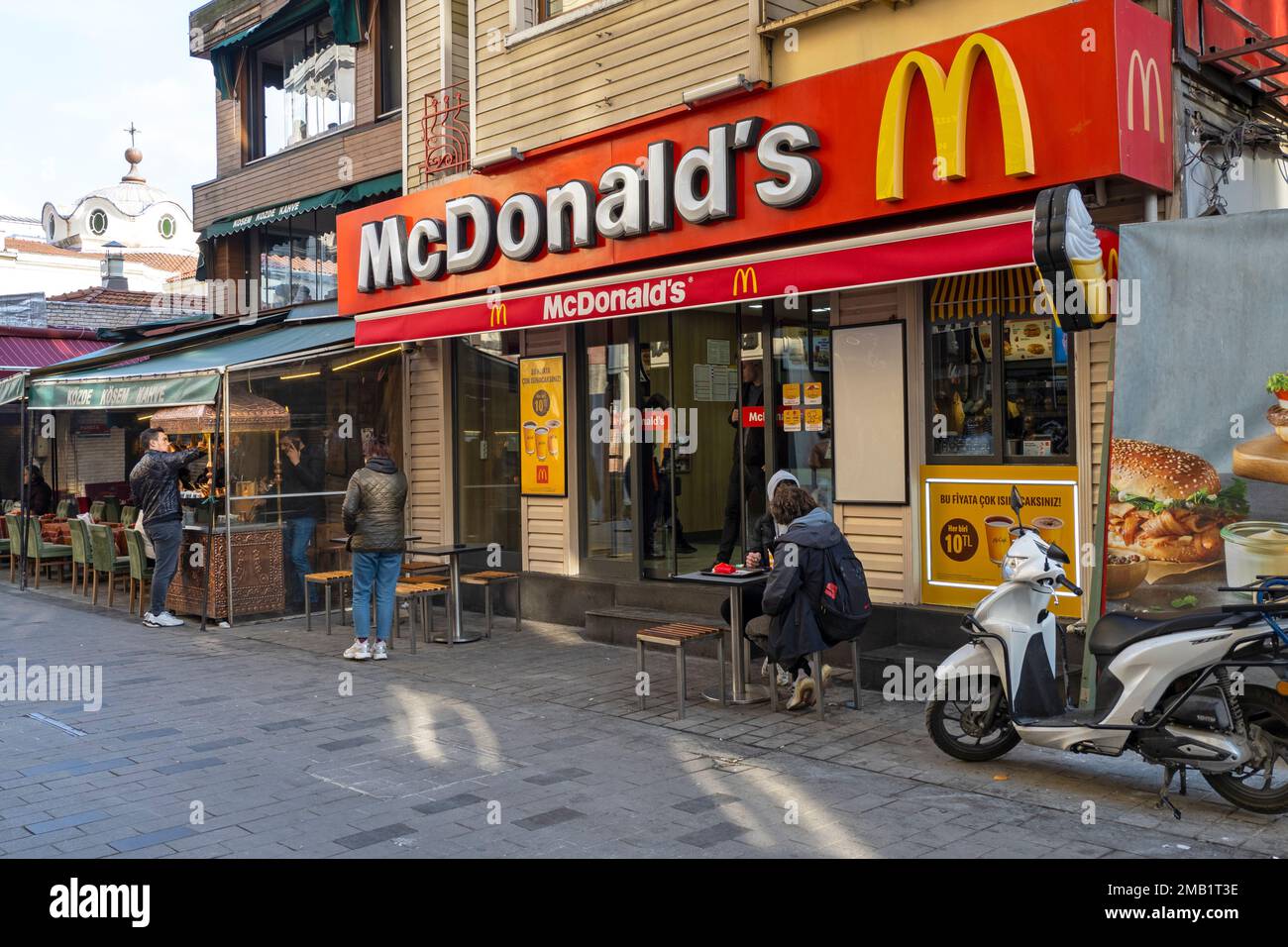ISTANBUL - JAN 15: Facade of McDonald restaurant with visitors in a ...