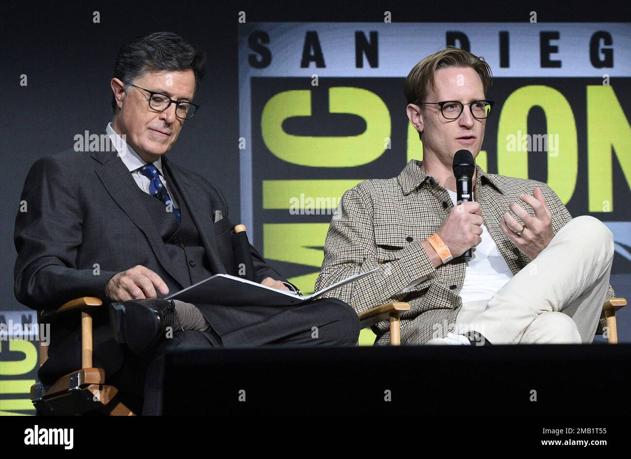 Moderator Stephen Colbert, left, and JD Payne attend a panel for "The ...
