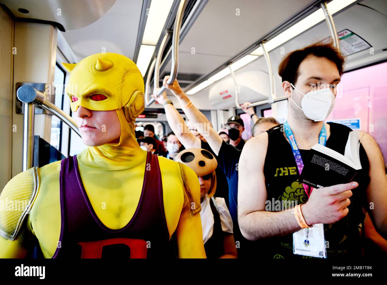 Comic-Con visitors ride the trolley to the convention on day two of ...