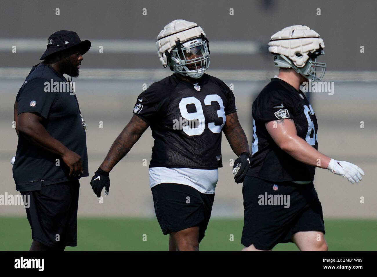 Las Vegas Raiders' Neil Farrell Jr., center practices during NFL ...
