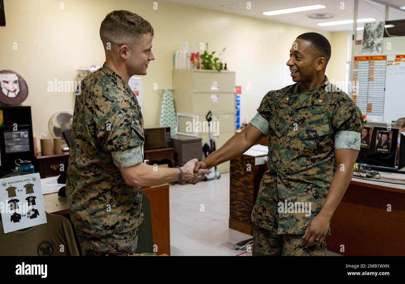 U.S. Marine Corps 1st Lt. Joshua Womack, left, a watch commander with ...
