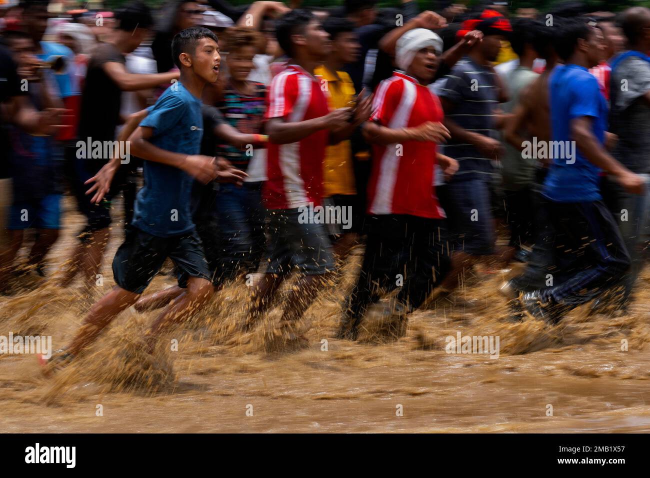 Pnar, or Jaintia, tribals dance in muddy waters during Behdienkhlam ...
