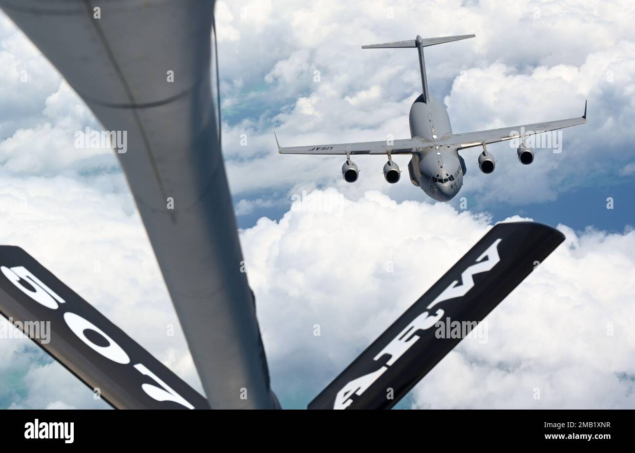 A C-17 Globemaster assigned to the 305th Air Mobility Wing, Joint Base ...