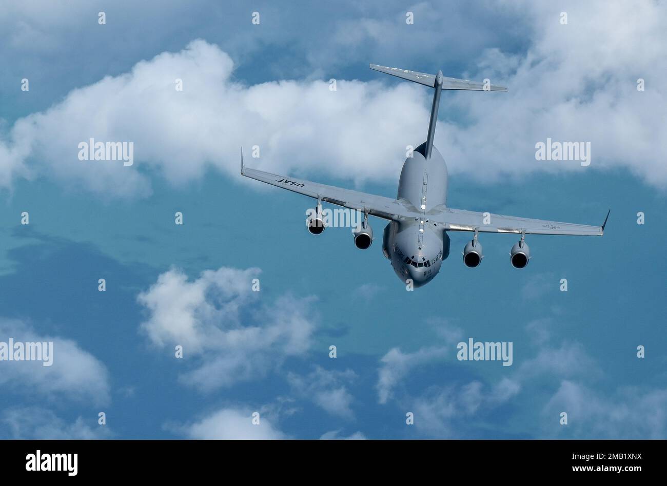 A C-17 Globemaster assigned to the 305th Air Mobility Wing, Joint Base ...