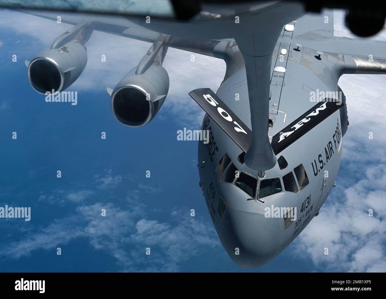 A C-17 Globemaster assigned to the 305th Air Mobility Wing, Joint Base ...