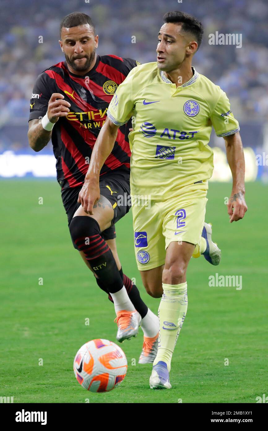 Manchester City defender Kyle Walker, left, chases Club America Luis ...