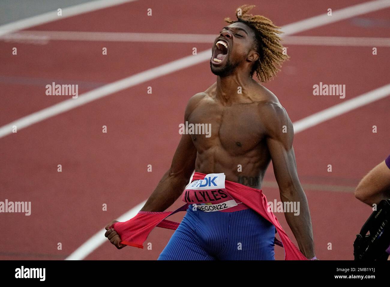 Noah Lyles, of the United States, celebrates after winning the men's ...