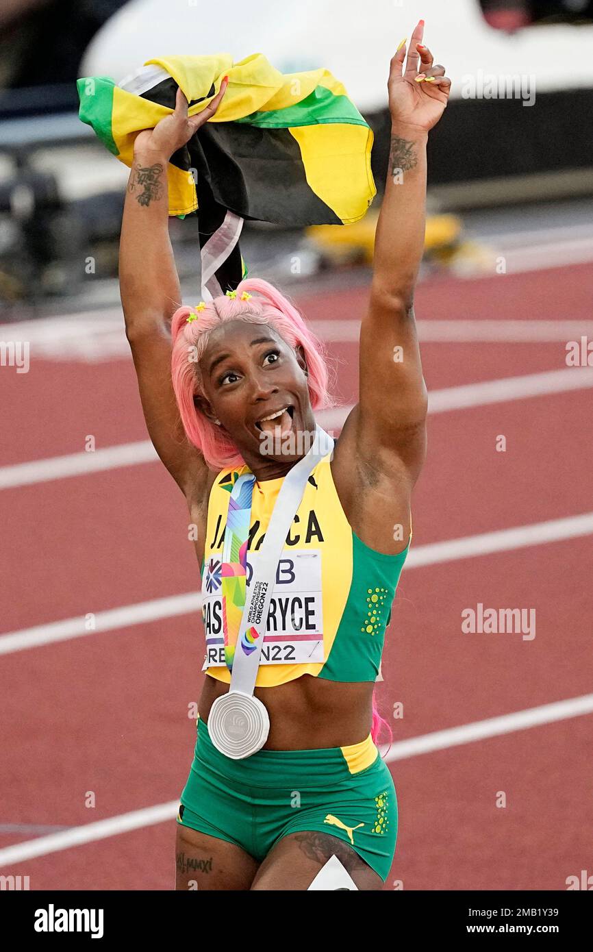 Silver medalist Shelly-Ann Fraser-Pryce, of Jamaica celebrates after ...