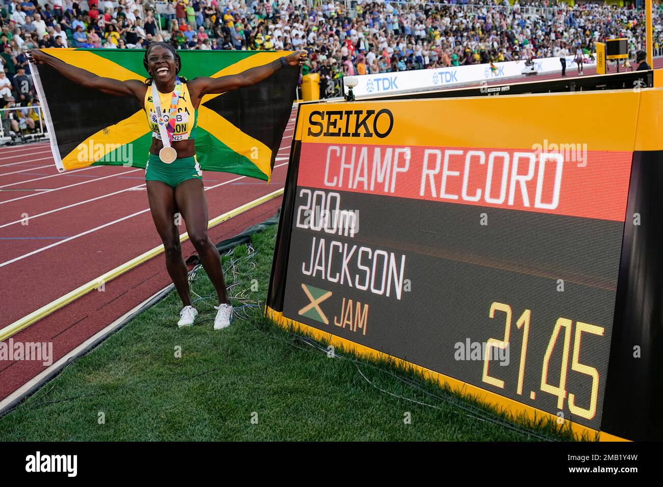 Shericka Jackson, of Jamaica, celebrates after winning of the final of ...
