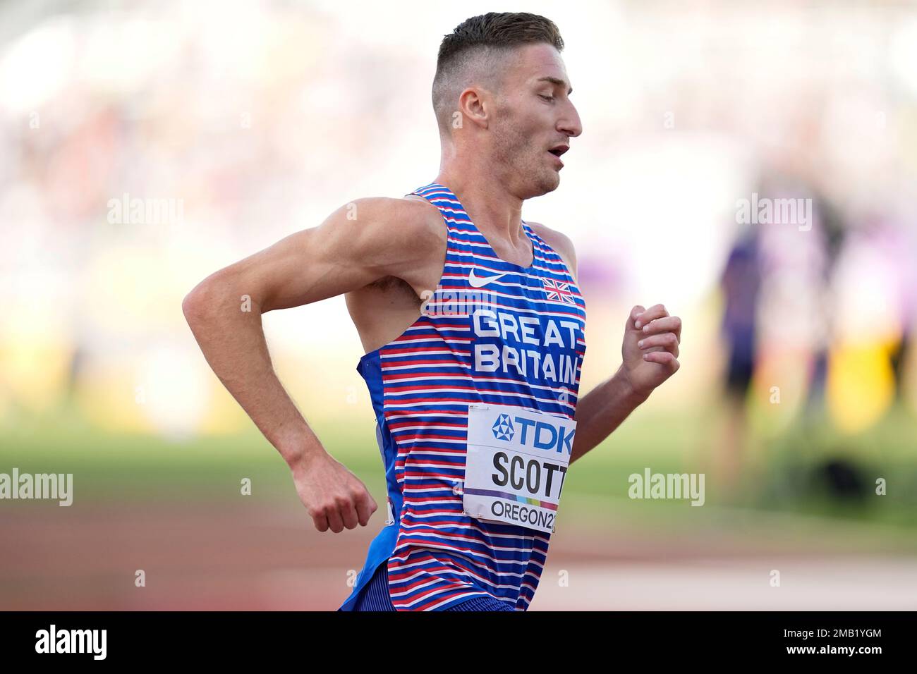 Marc Scott, of Britain, competes during a heat in the men's 5000-meter ...