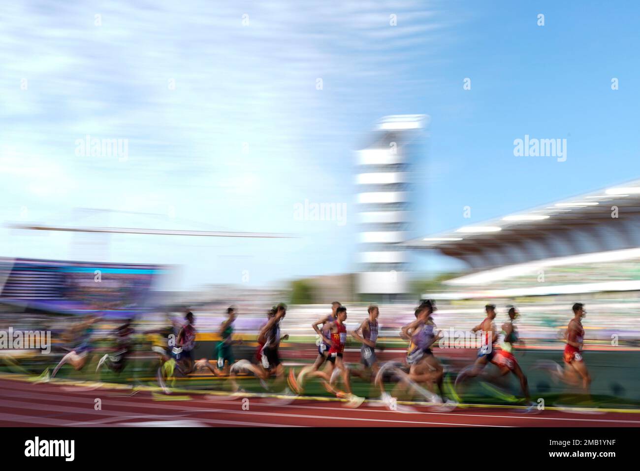 Men compete during a heat in the men's 5000-meter run at the World ...