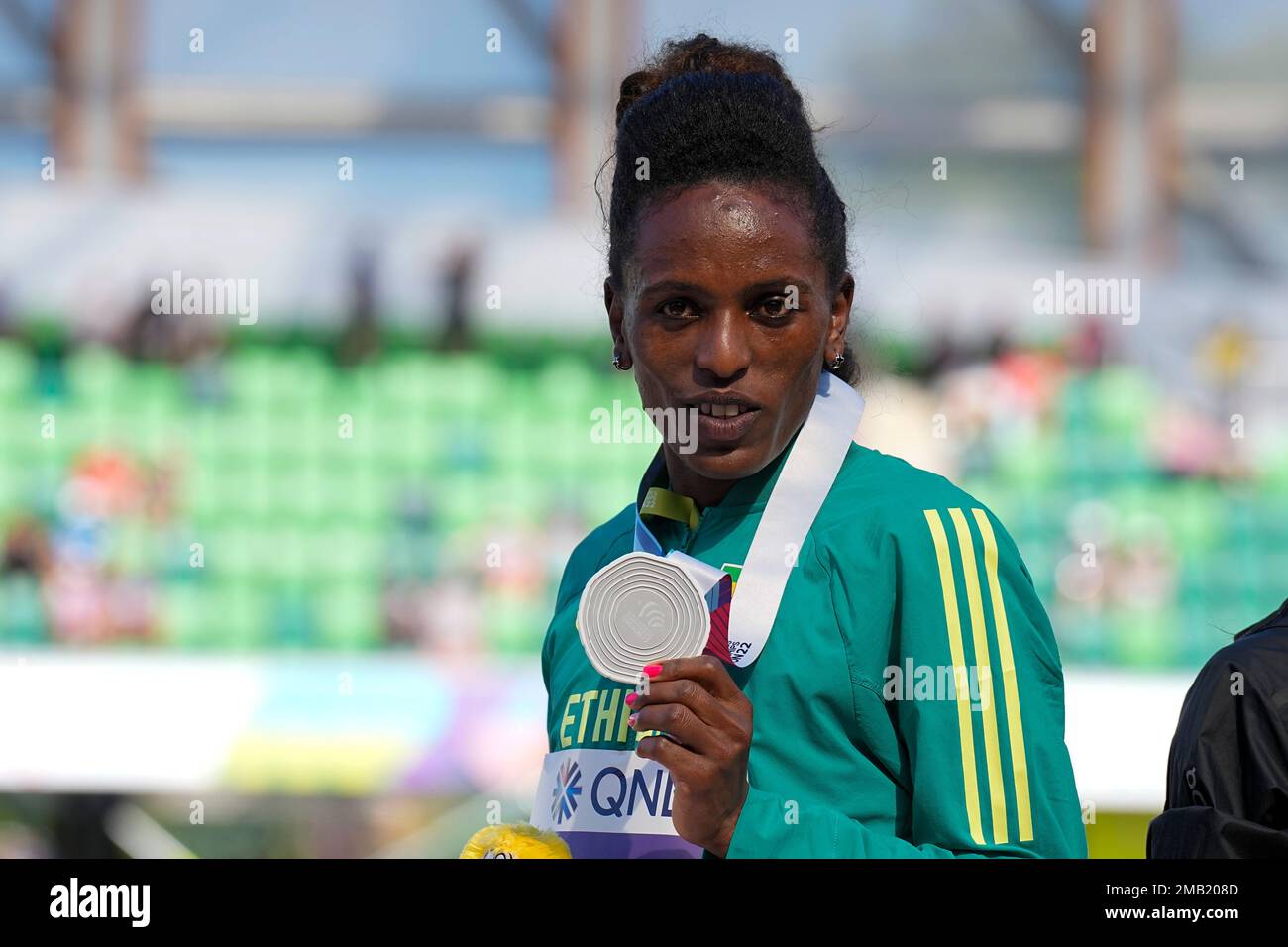 Silver medalist Werkuha Getachew, of Ethiopia, poses during a medal ...