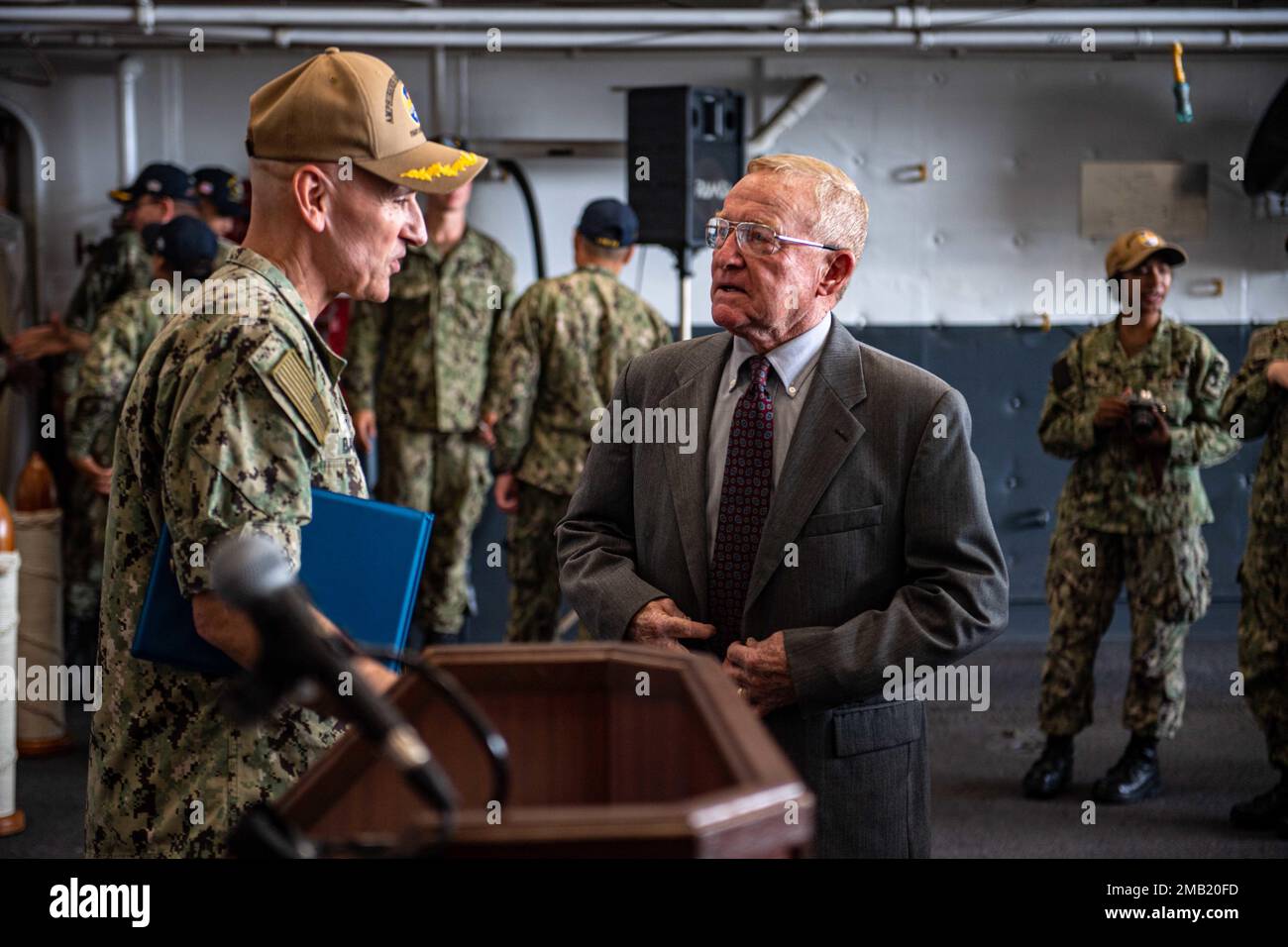 SASEBO, Japan (June 10, 2022) Captain Greg Baker, left, speaks with retired Capt. John Hamilton ...