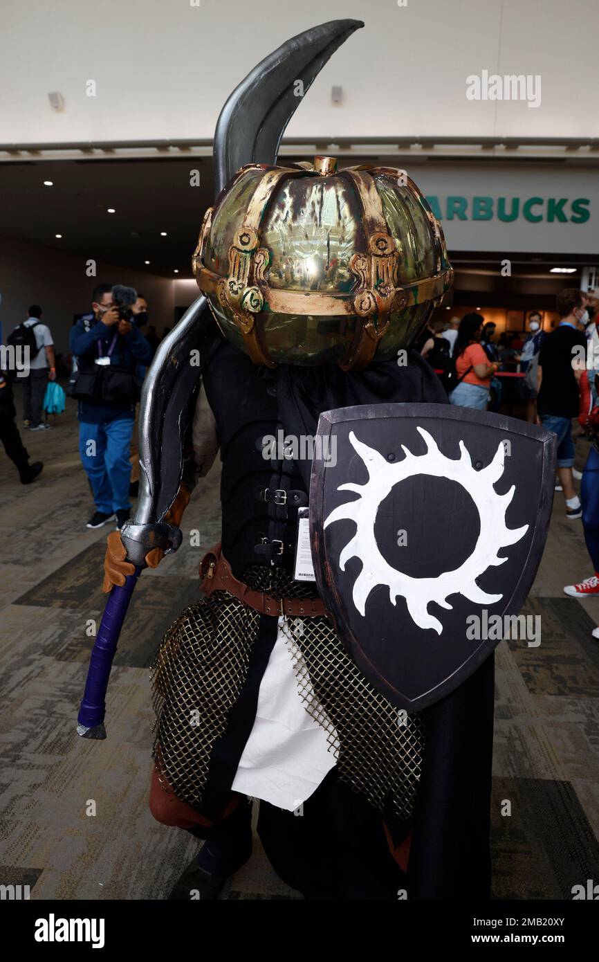 Keith Foster, of San Diego, dressed as The Pumpkin Knight, attends day ...