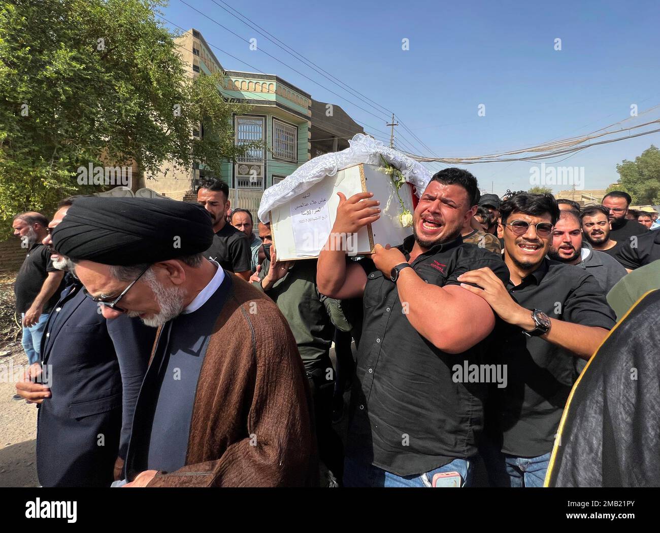 The coffin carrying Abbas Abdul Hussein, a 30-year-old victim of an ...