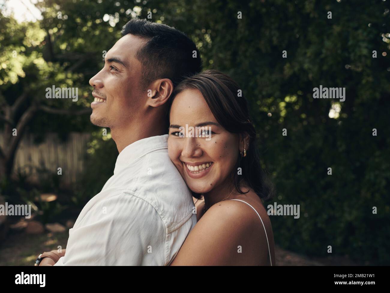 Behind every strong man is a strong woman. a happy young couple ...